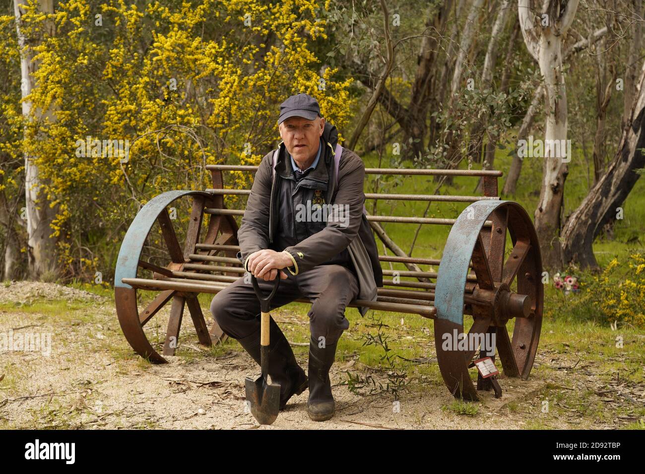 Prospector sitting on a up cycled bench seat at Eldorado, Australia ...