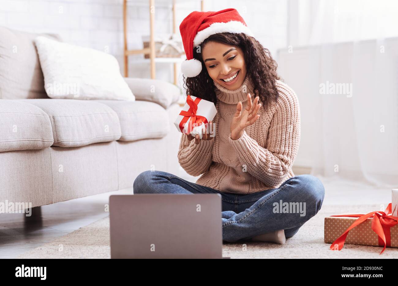 Woman opening present hi-res stock photography and images - Alamy