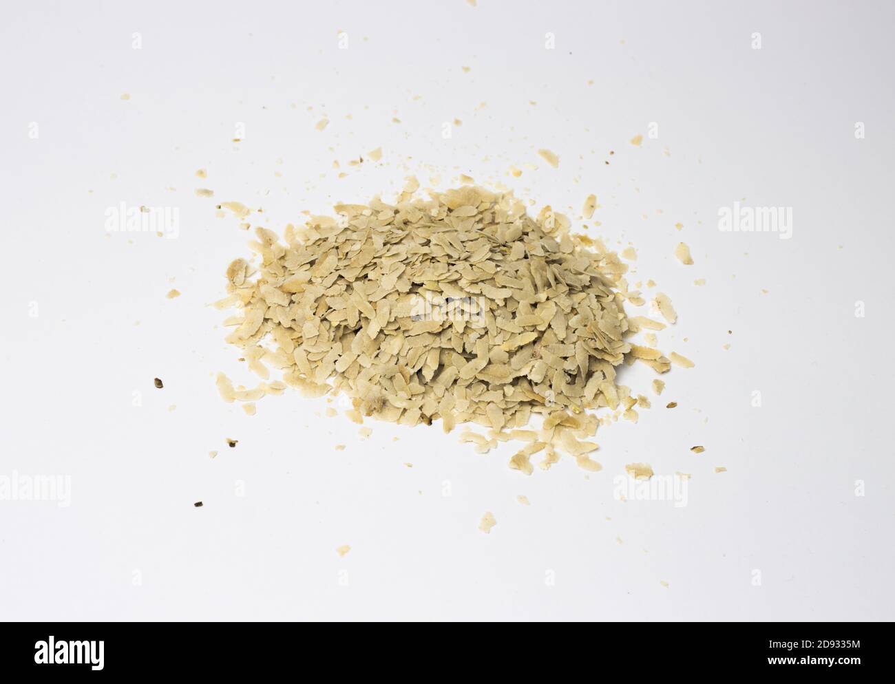 Fresh brown flattened rice isolated on white background Stock Photo - Alamy