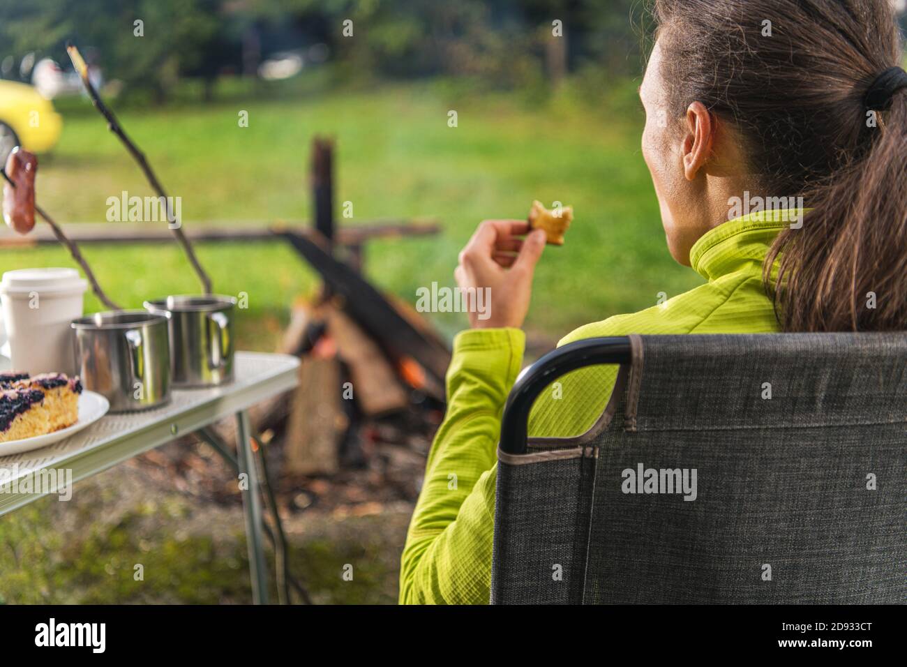 Caucasian Woman in Her 30s and the Outdoor Lunch Time. Eating Campfire ...