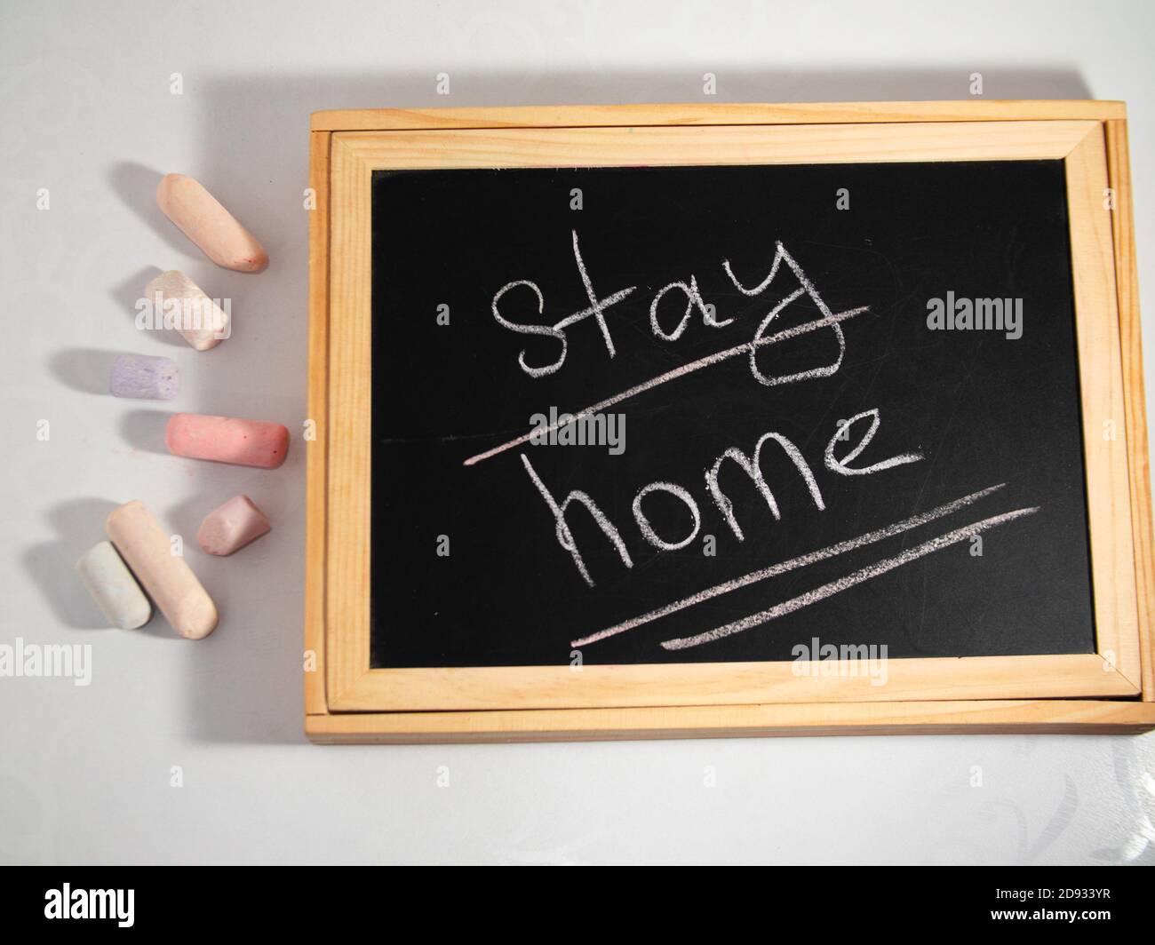 chalk on a blackboard : stay at home. the concept of isolation. the ...