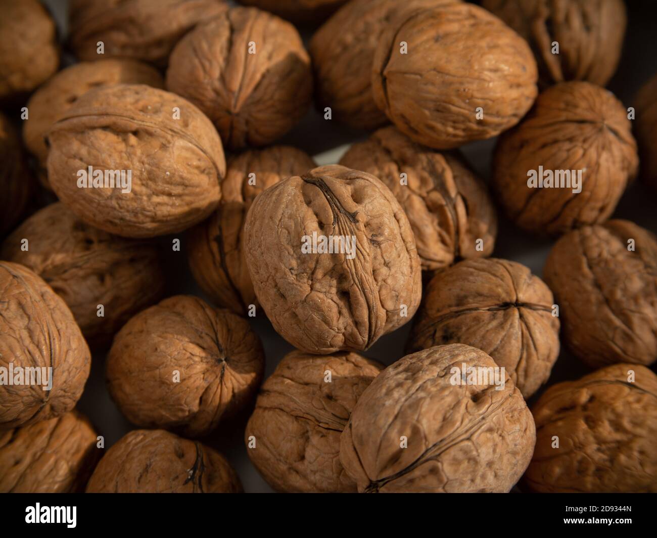 Scattered pile of walnuts hi-res stock photography and images - Alamy