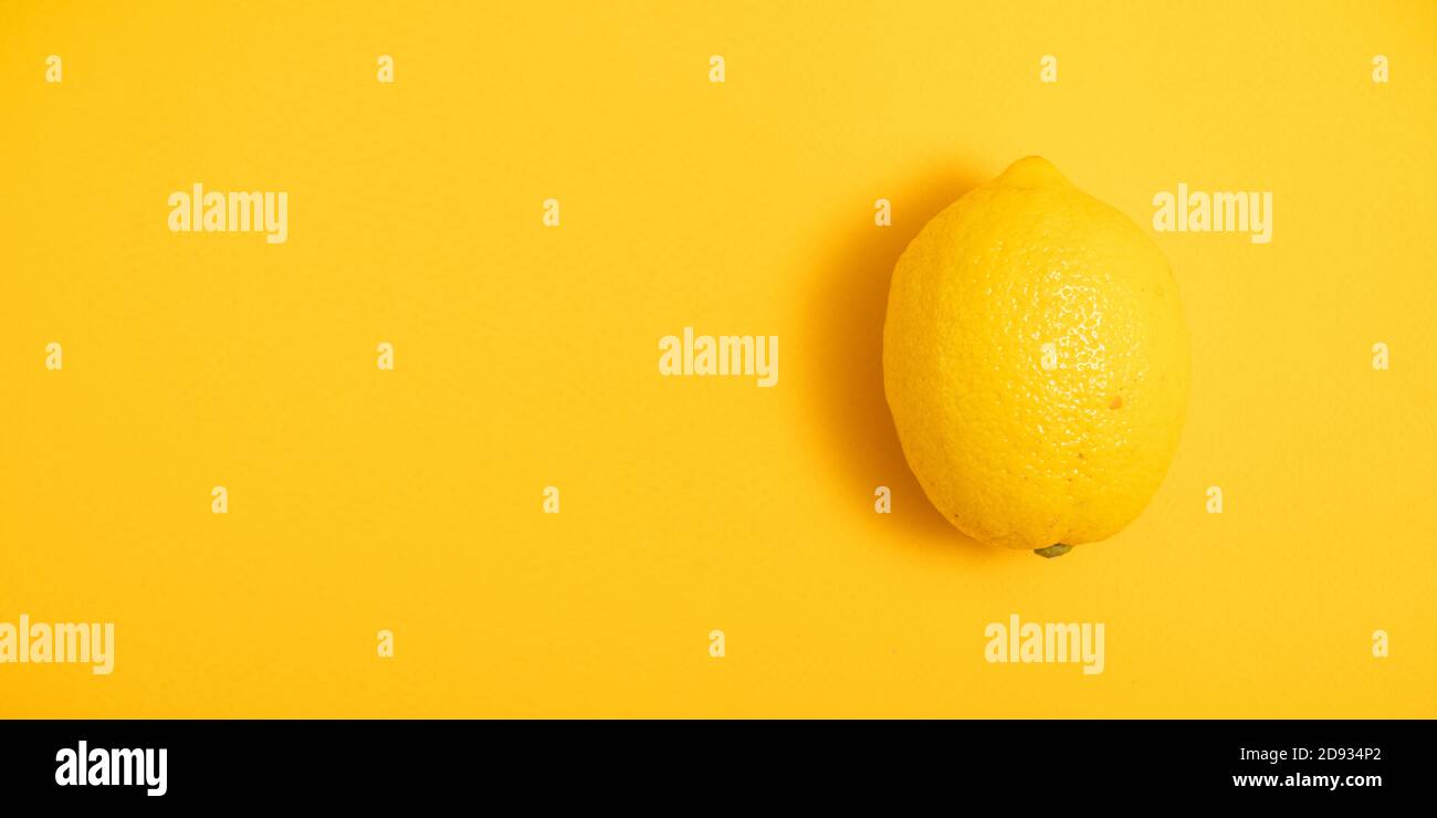 lemon on a yellow background. banner with an empty space under the text ...
