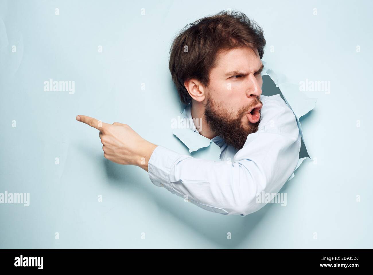 Angry man gestures with his hands dissatisfaction emotions work office ...