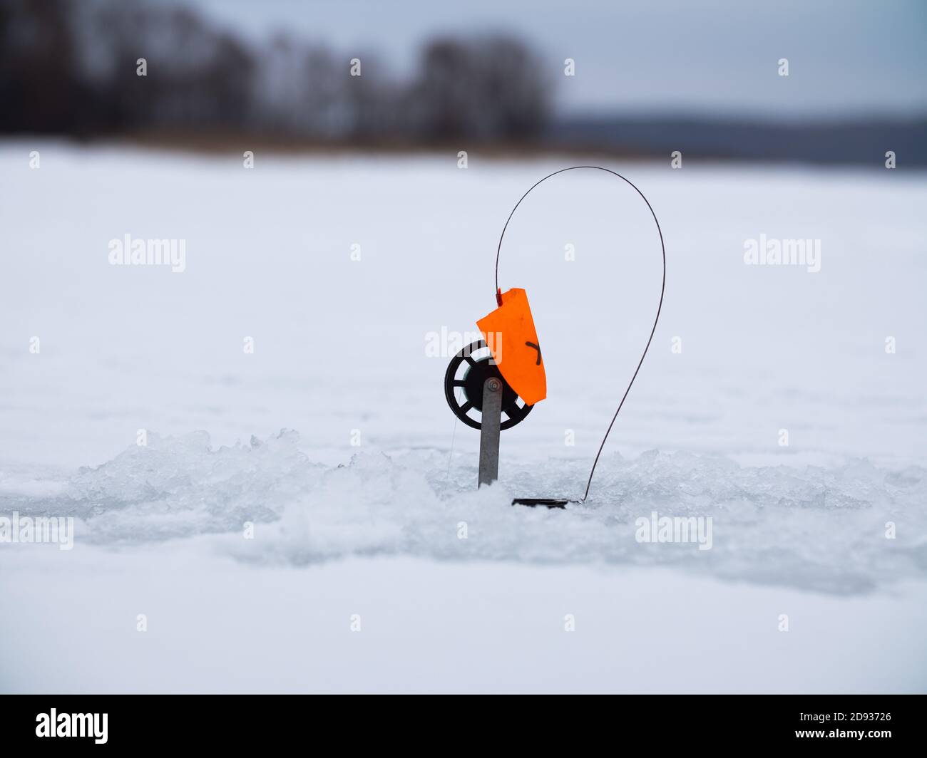 equipment for winter fishing on ice. imitation fish and drill for ...