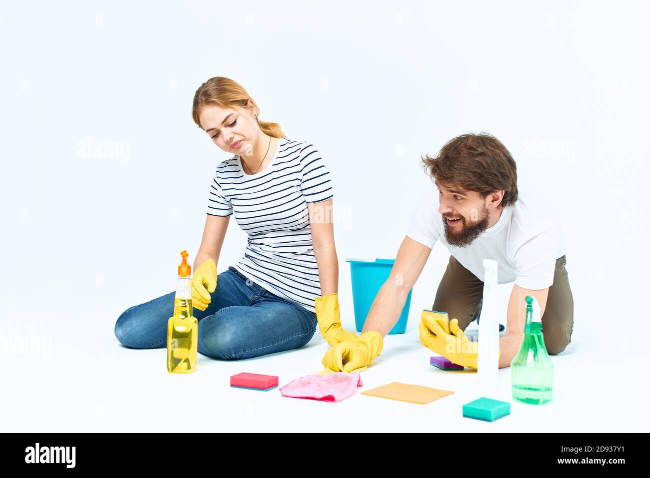 Man and woman detergent lifestyle cleaning teamwork Stock Photo - Alamy