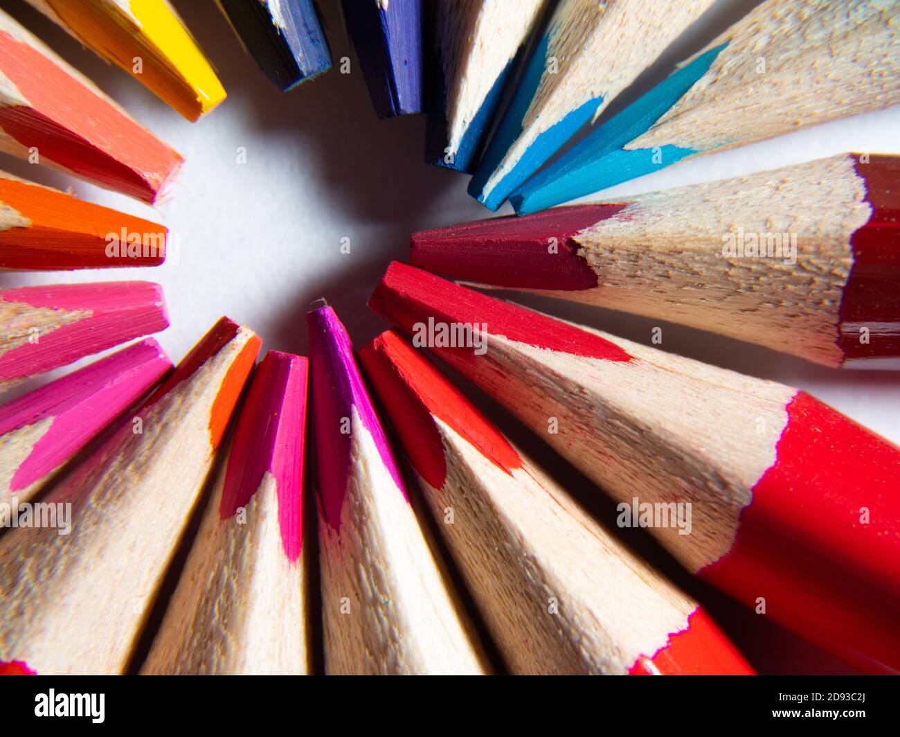 macrophotography of colored pencils on a white background. back to ...