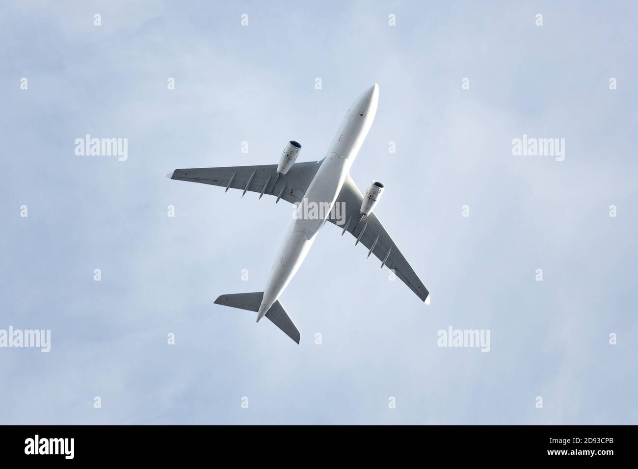 Travel, transportation, aviation. Passenger airplane flying overhead ...