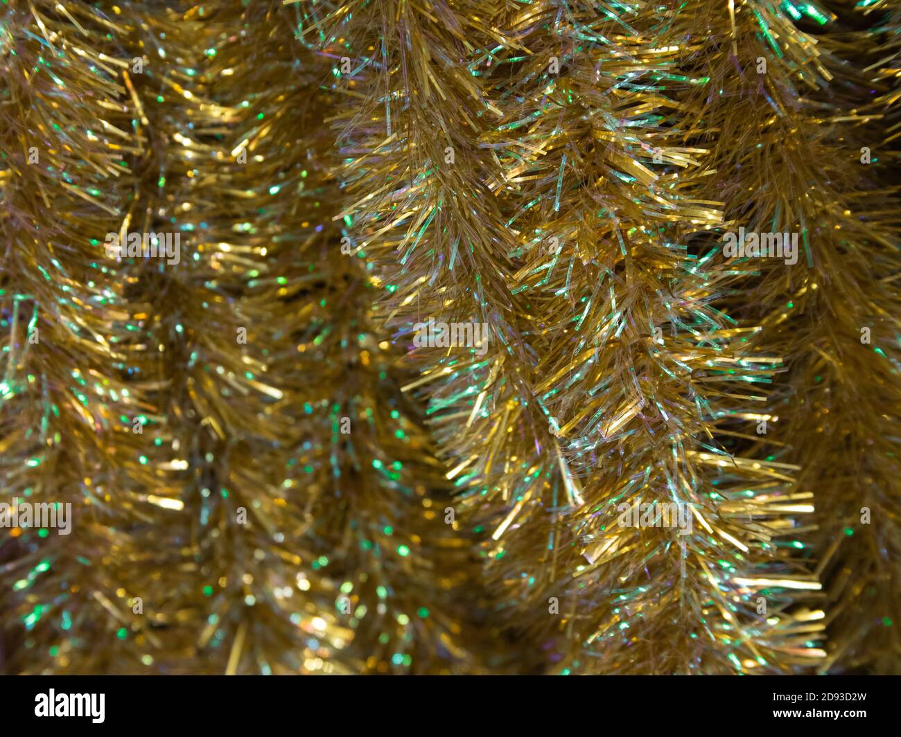 green and gold tinsel as Christmas Wallpaper or background Stock Photo ...