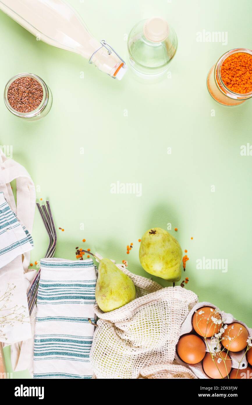 Green zero waste background with accessories Stock Photo - Alamy
