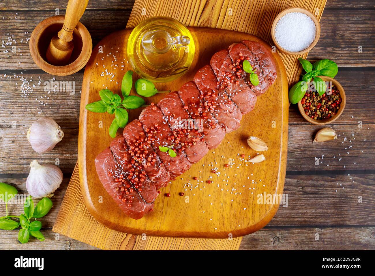 Raw beef tenderloin ready to cook with spices. Top view Stock Photo - Alamy