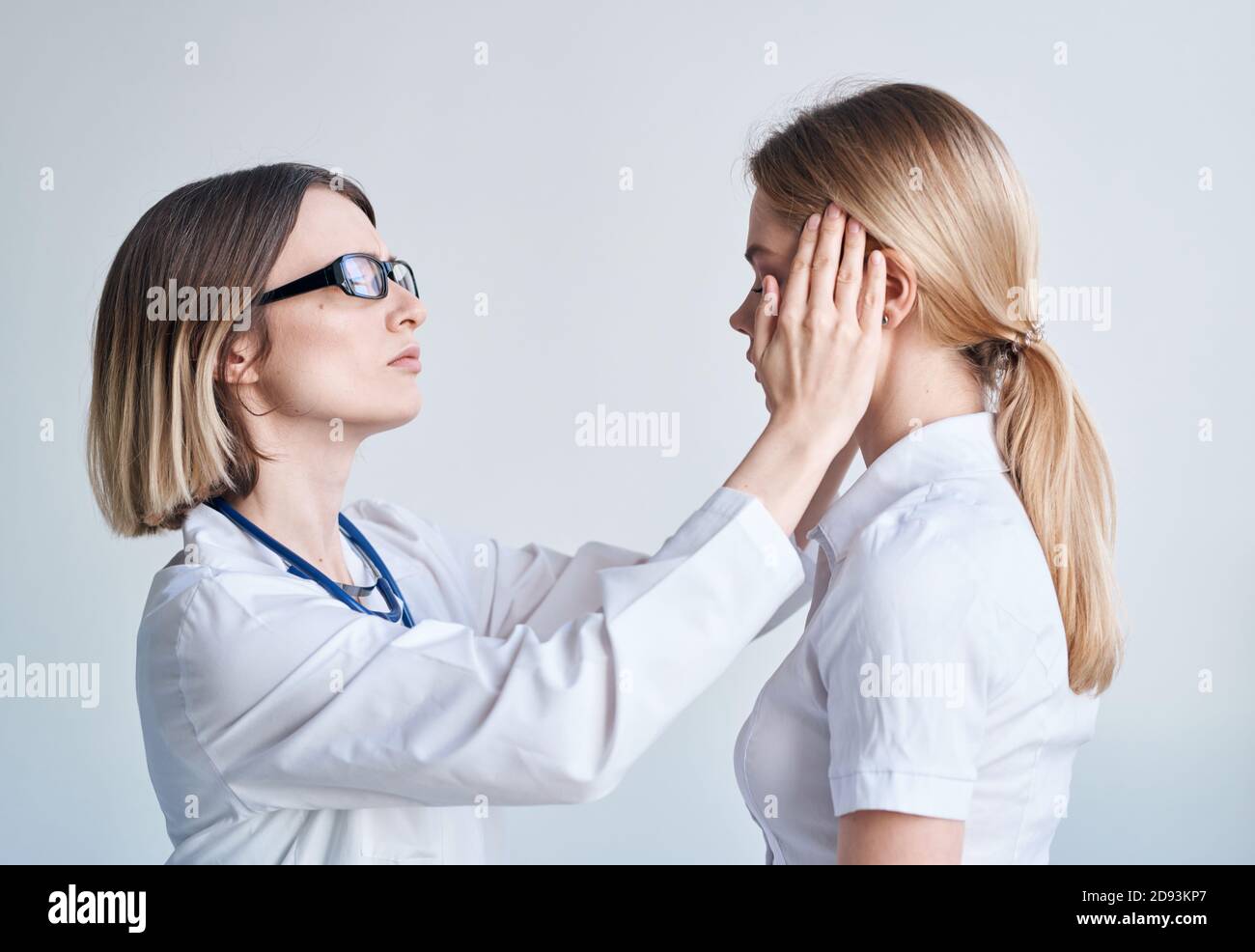 Doctor and patient on light blue background stethoscope health problems ...