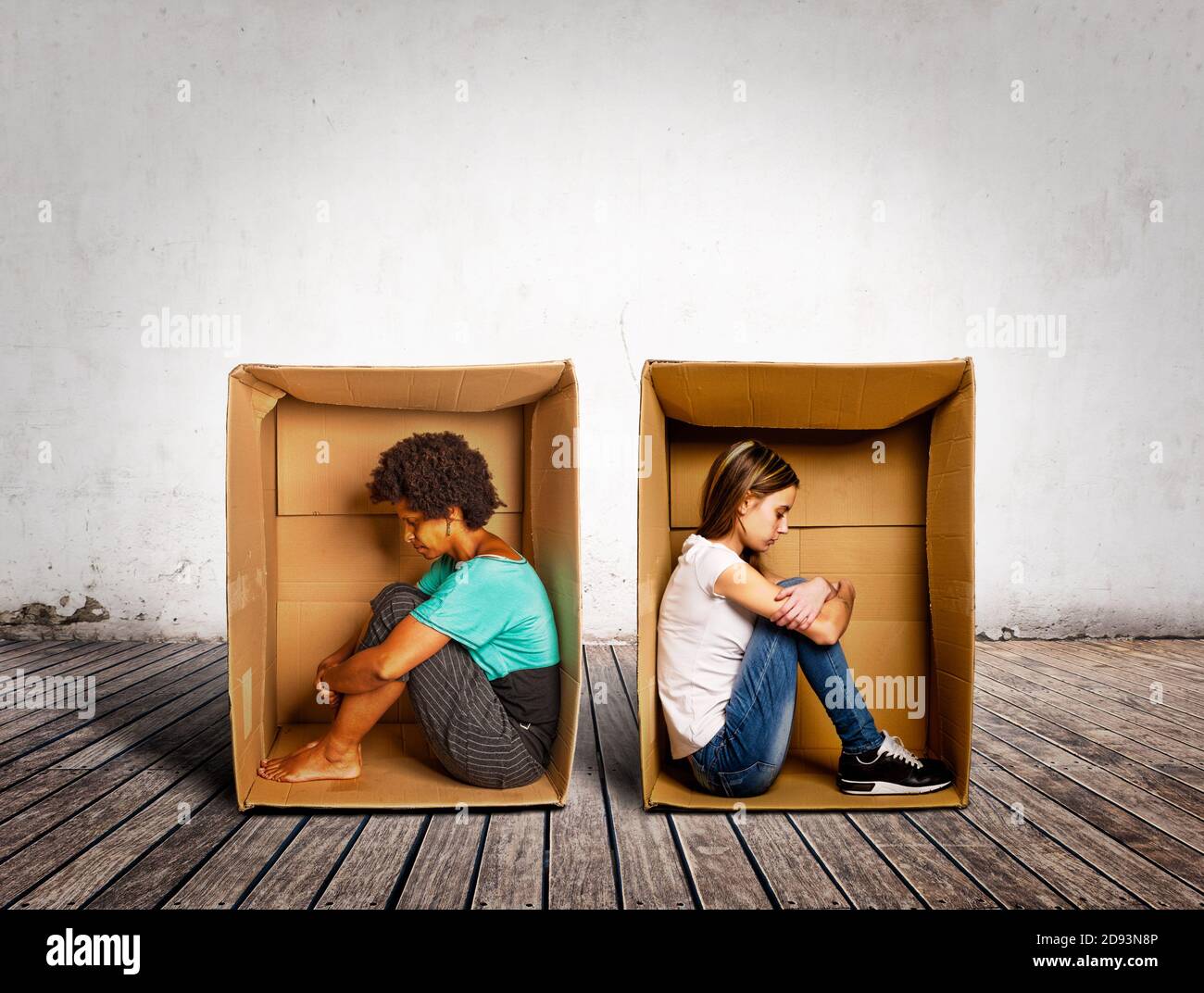 sad women inside a Box on a room Stock Photo - Alamy
