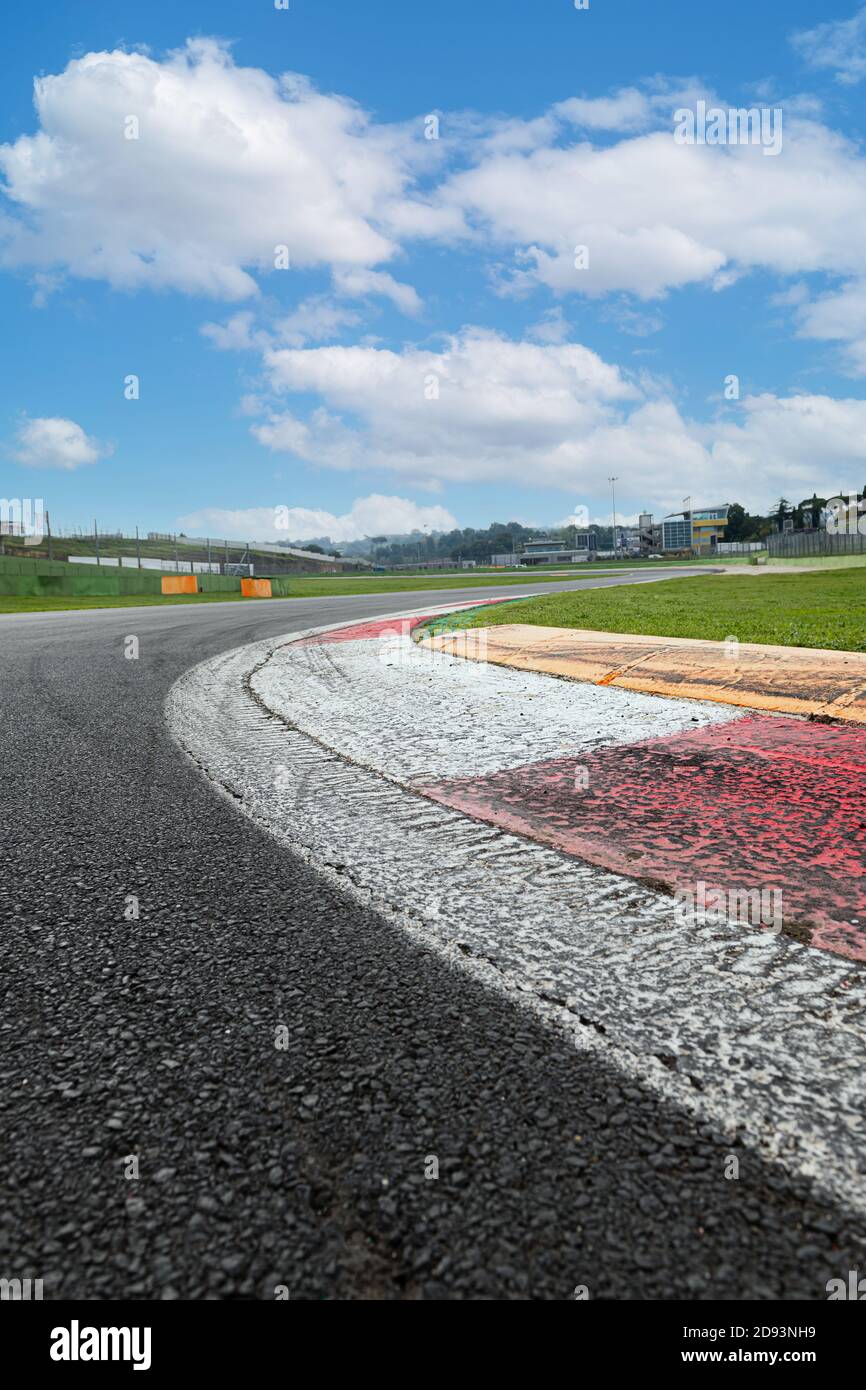 Motor sport circuit asphalt track background curb close up on turn low ...