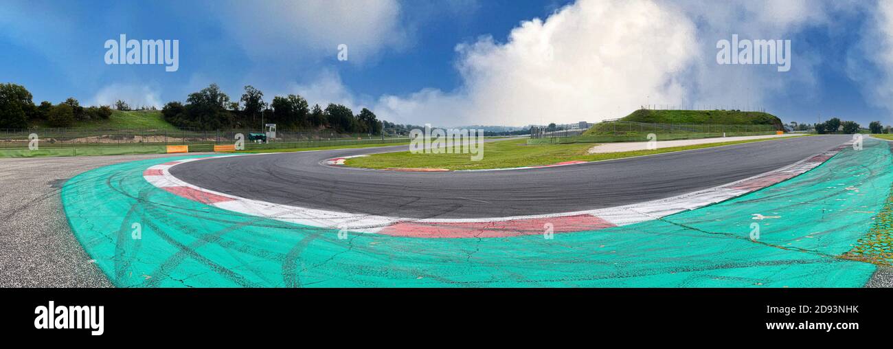 Asphalt motor sport circuit turn wide panoramic view many skid marks on ...