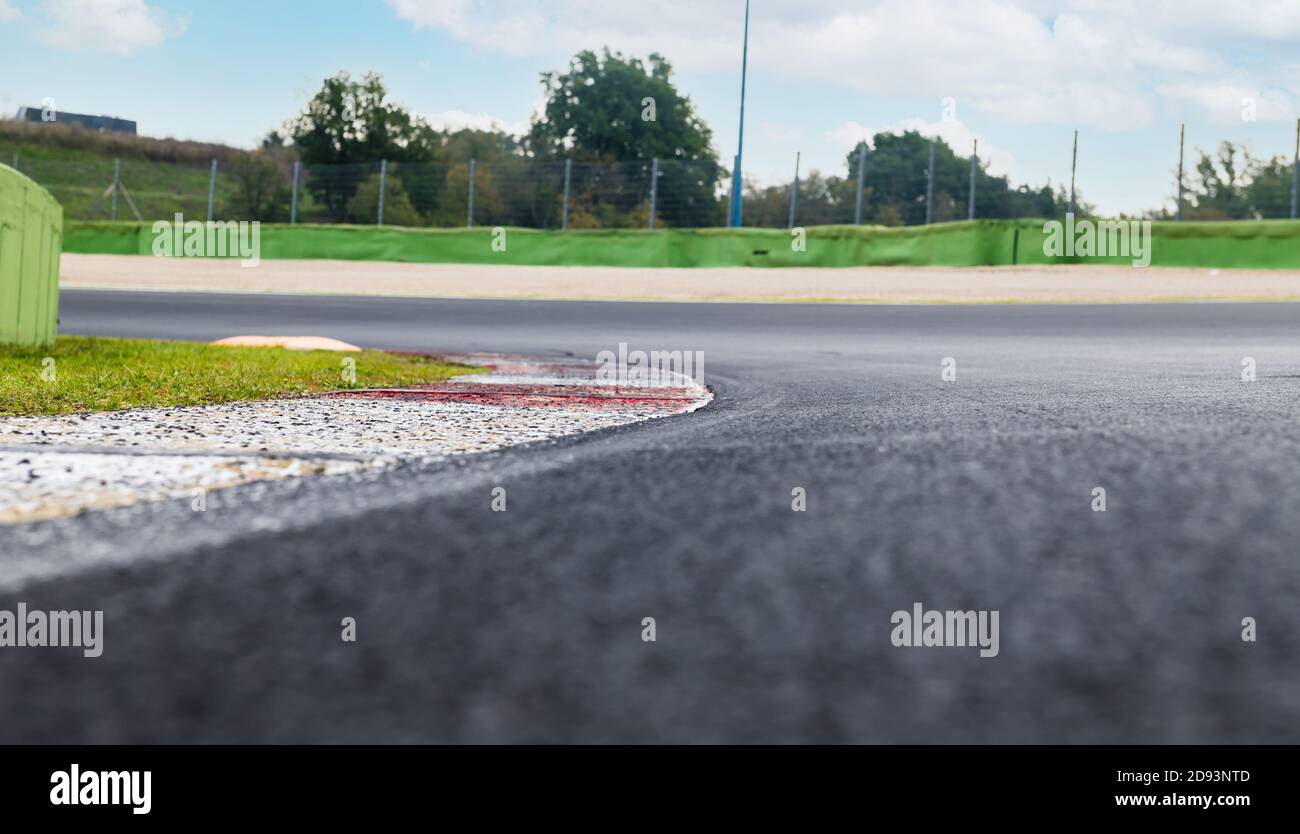 Curb on asphalt track motor sport detail selective focus circuit turn ...