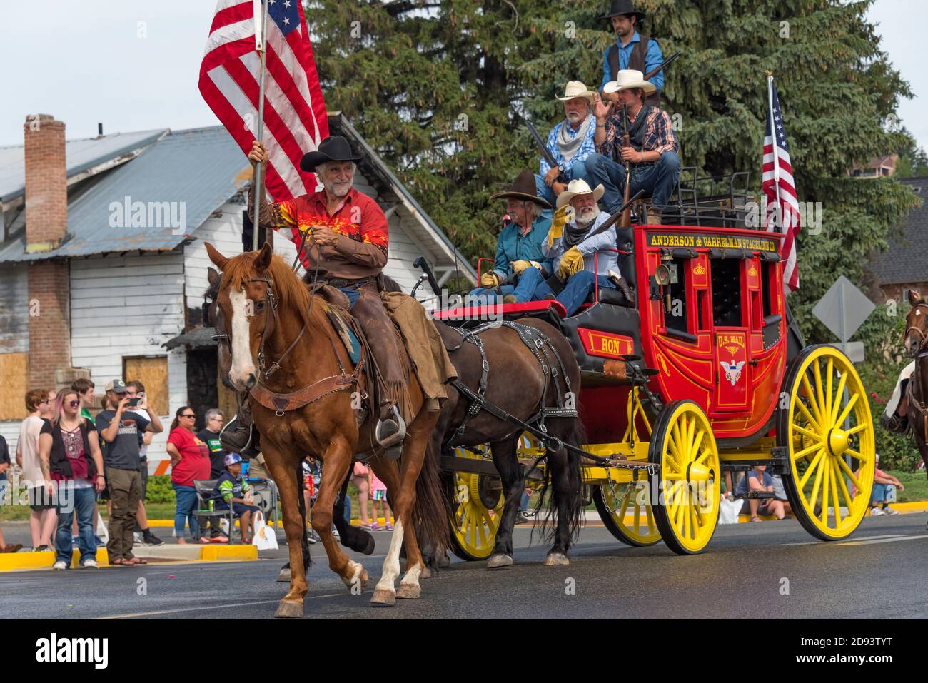 Old day's carriage holding American flag at the Grand Parade during ...