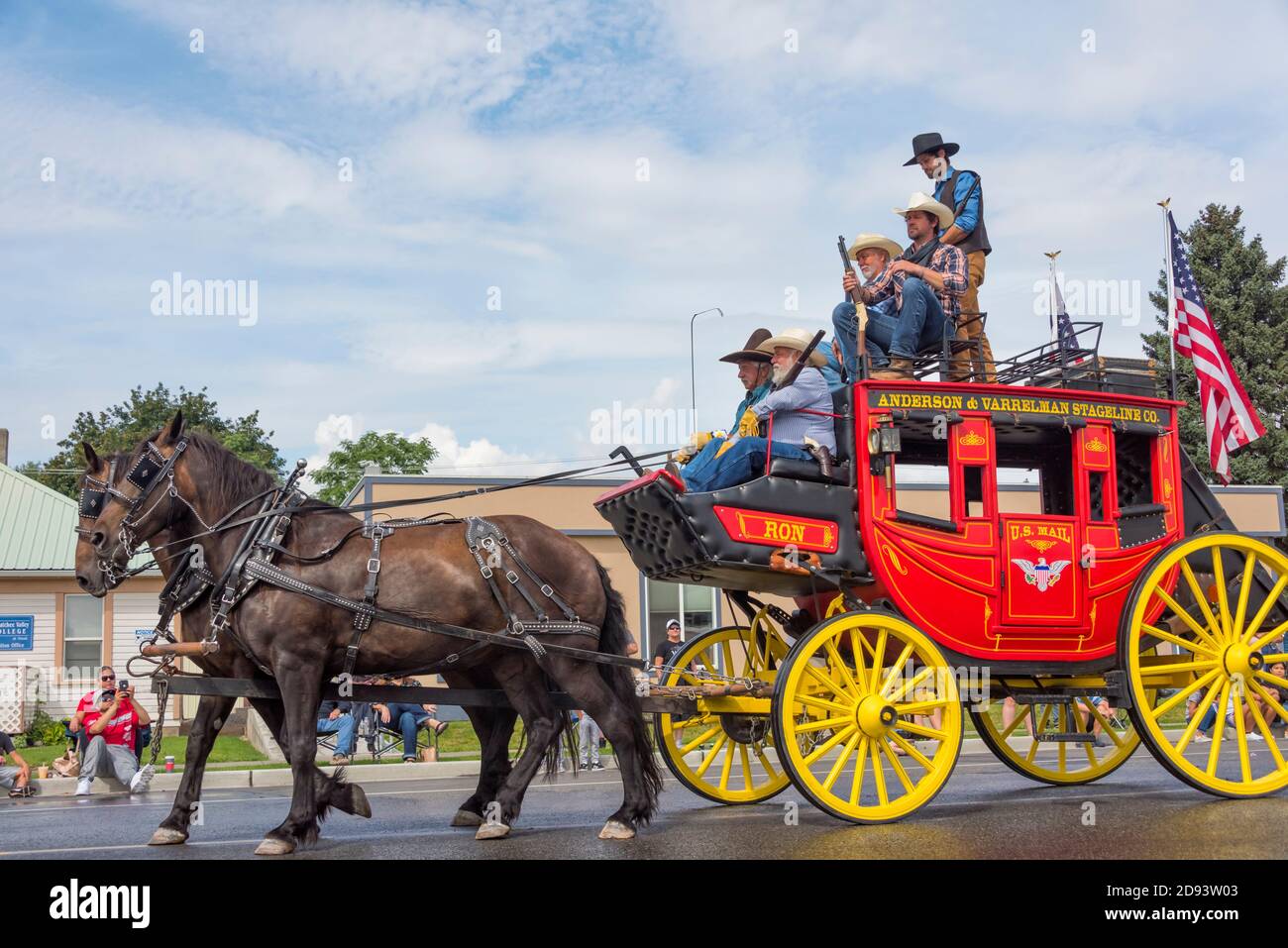 Old day's carriage holding American flag at the Grand Parade during ...