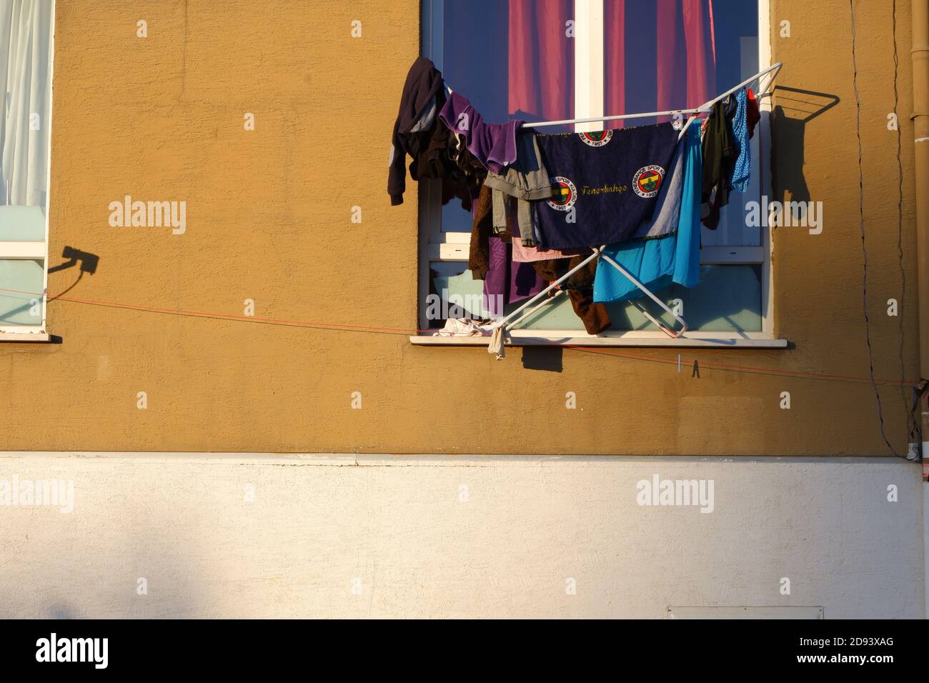 Laundry hanging out of window hi-res stock photography and images - Alamy
