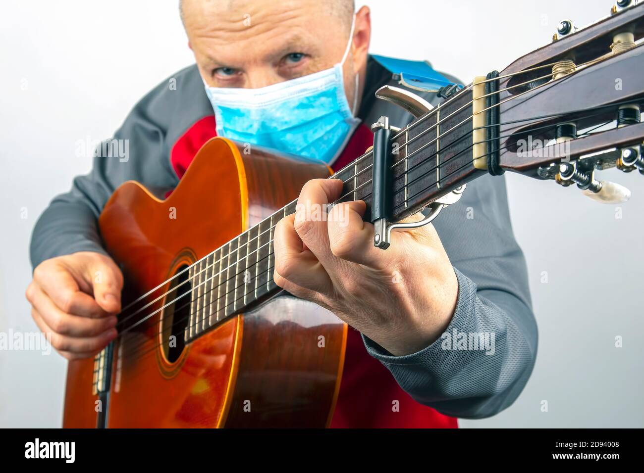 Masked guitar player hi-res stock photography and images - Alamy