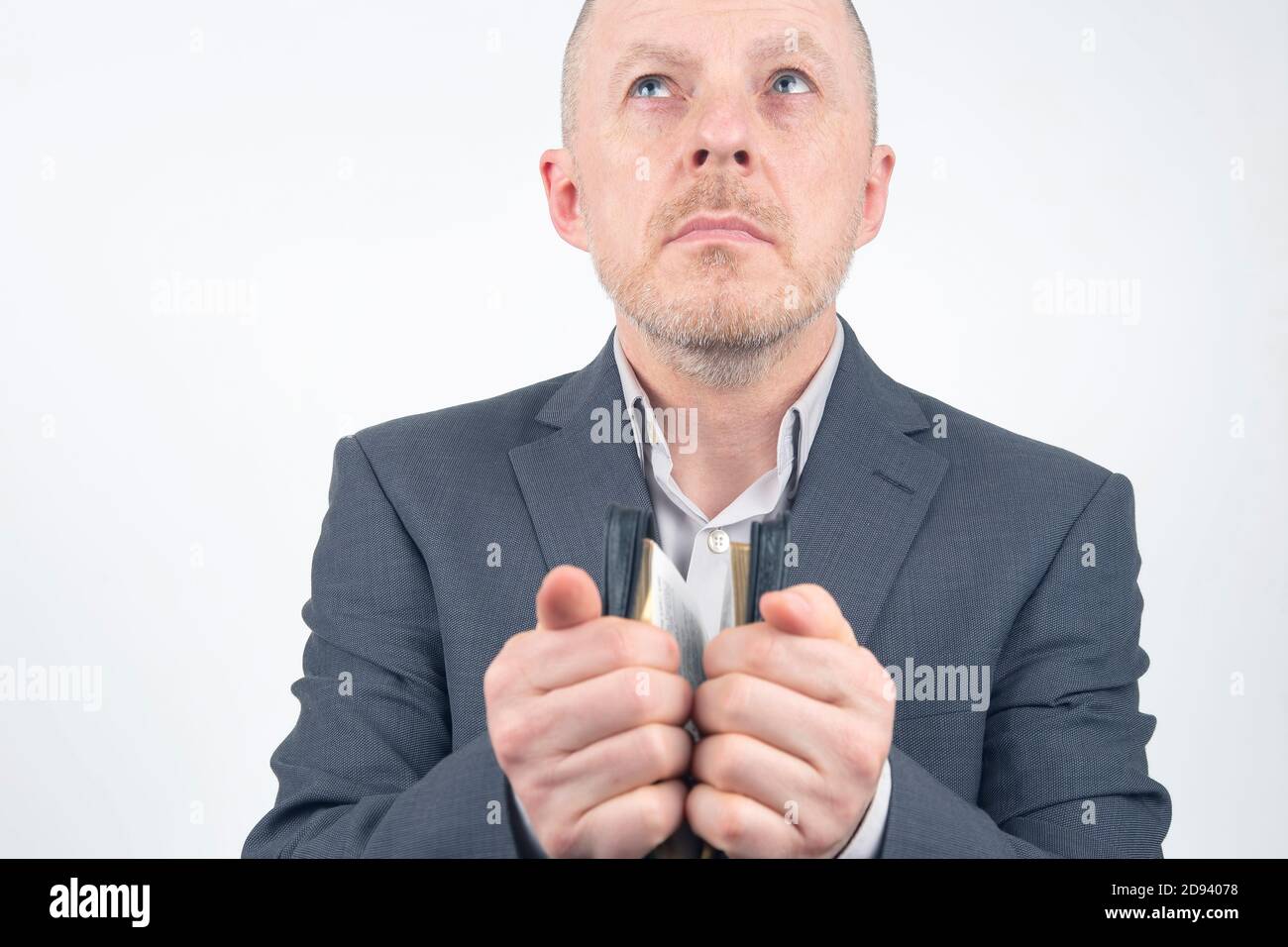 Man In Suit Holding Bible High Resolution Stock Photography and Images ...