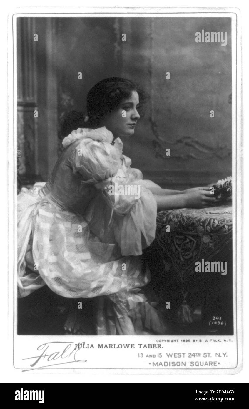 Julia Marlowe Taber, three-quarters length portrait, seated at table ...