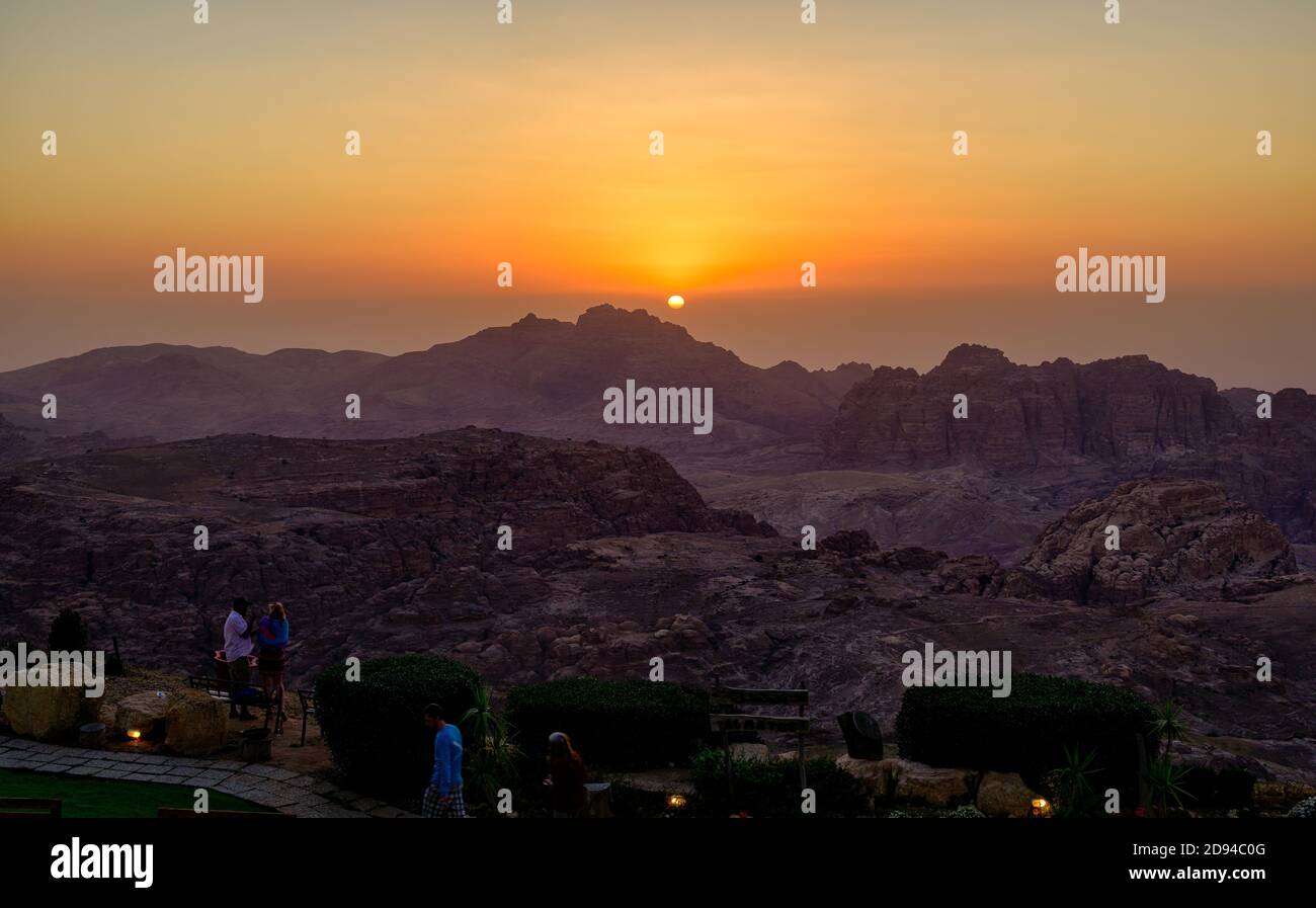 Sun setting behind Mount Hor, also known as Aaron's Mountain, in Petra ...