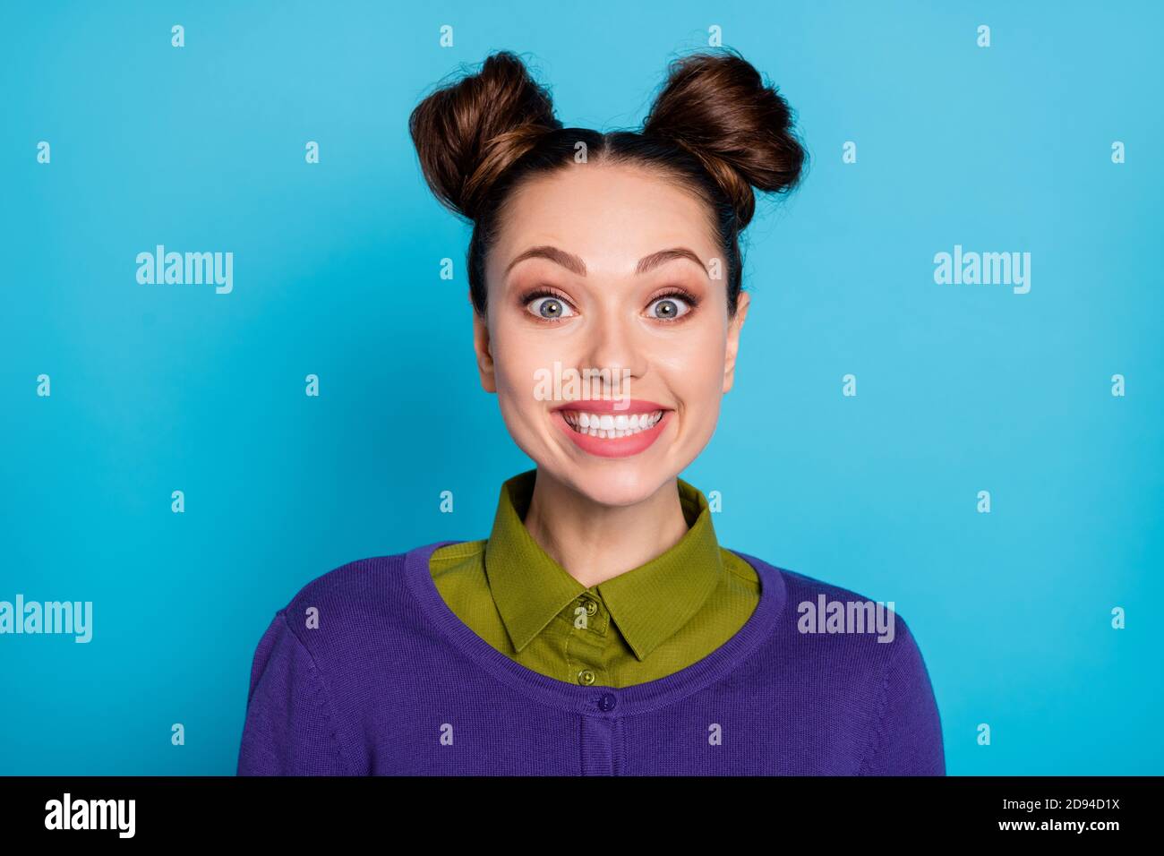 Closeup photo of attractive crazy lady two funny buns demonstrating ...