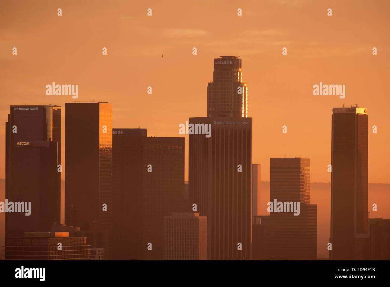 Golden light over the Los Angeles downtown skyline at sunset as viewed ...