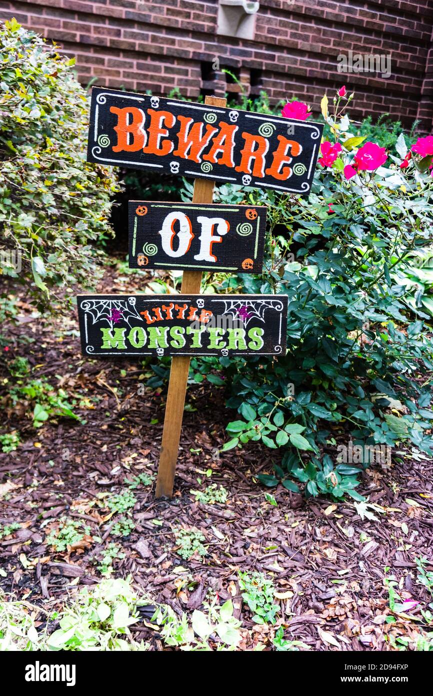 Halloween lawn sign that says beware of monsters Stock Photo - Alamy
