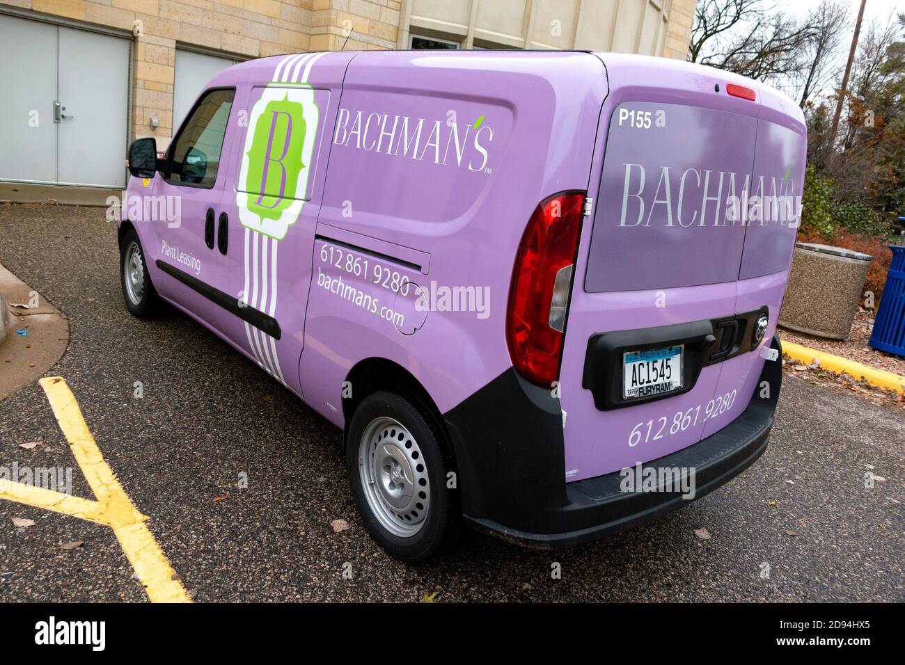 Purple Bachman's delivery truck at a building at St. Thomas University ...