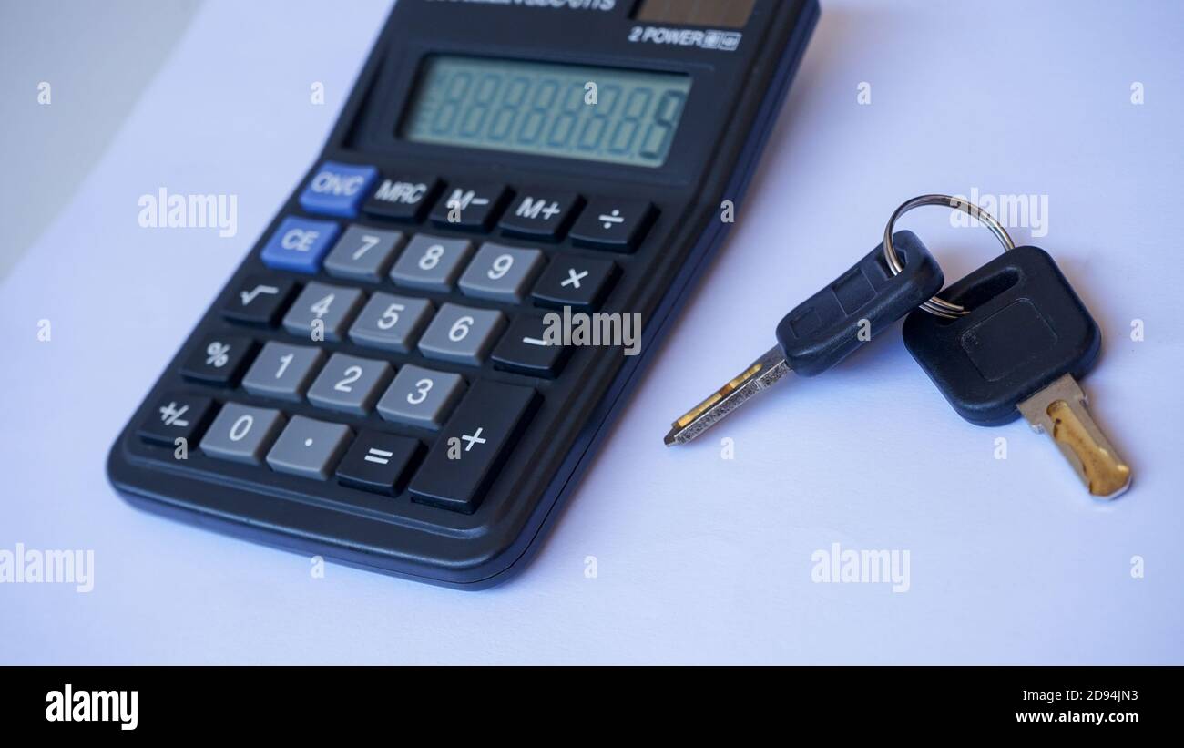 Close up calculator and keys Stock Photo - Alamy