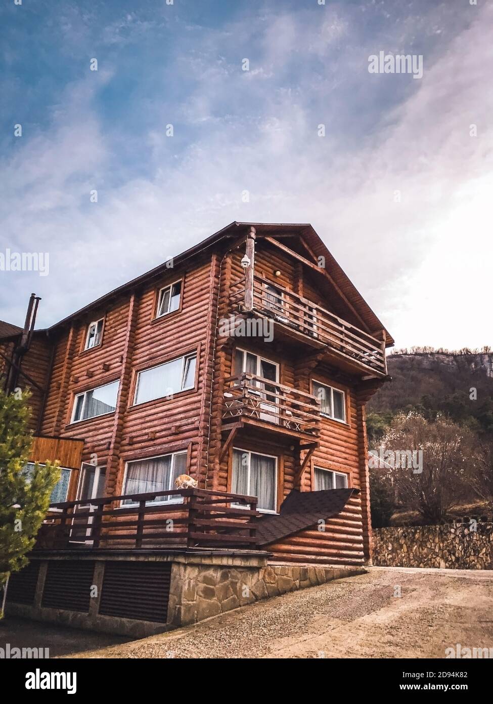 Beautiful wooden countryside dream house with plastic windows. Front ...