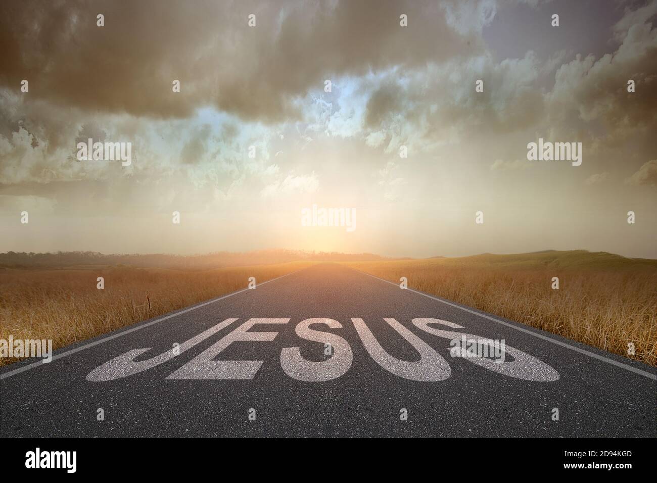 Jesus text on the street with a sunset sky background Stock Photo - Alamy