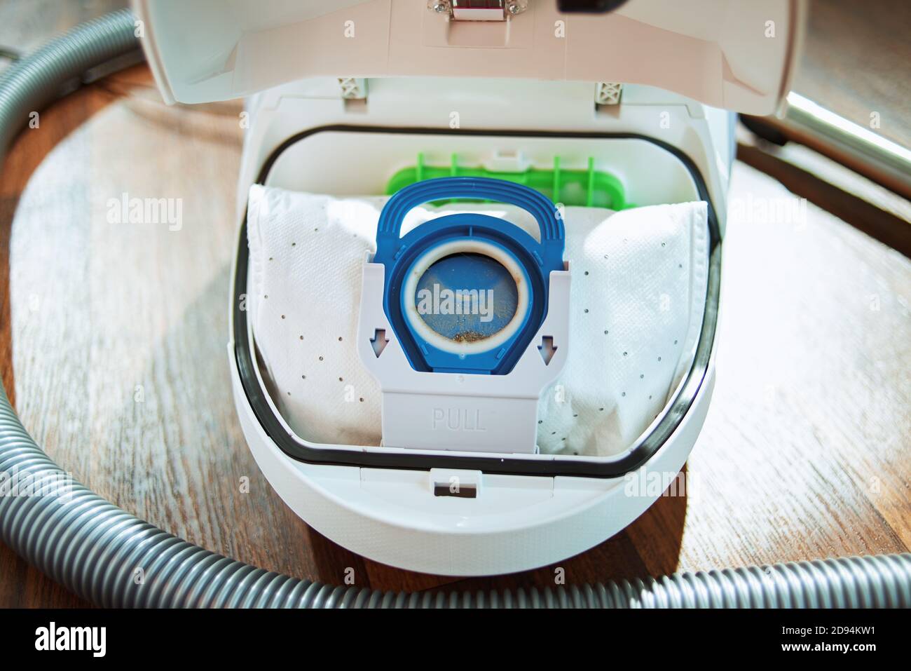 Closeup on garbage bag in vacuum cleaner Stock Photo - Alamy