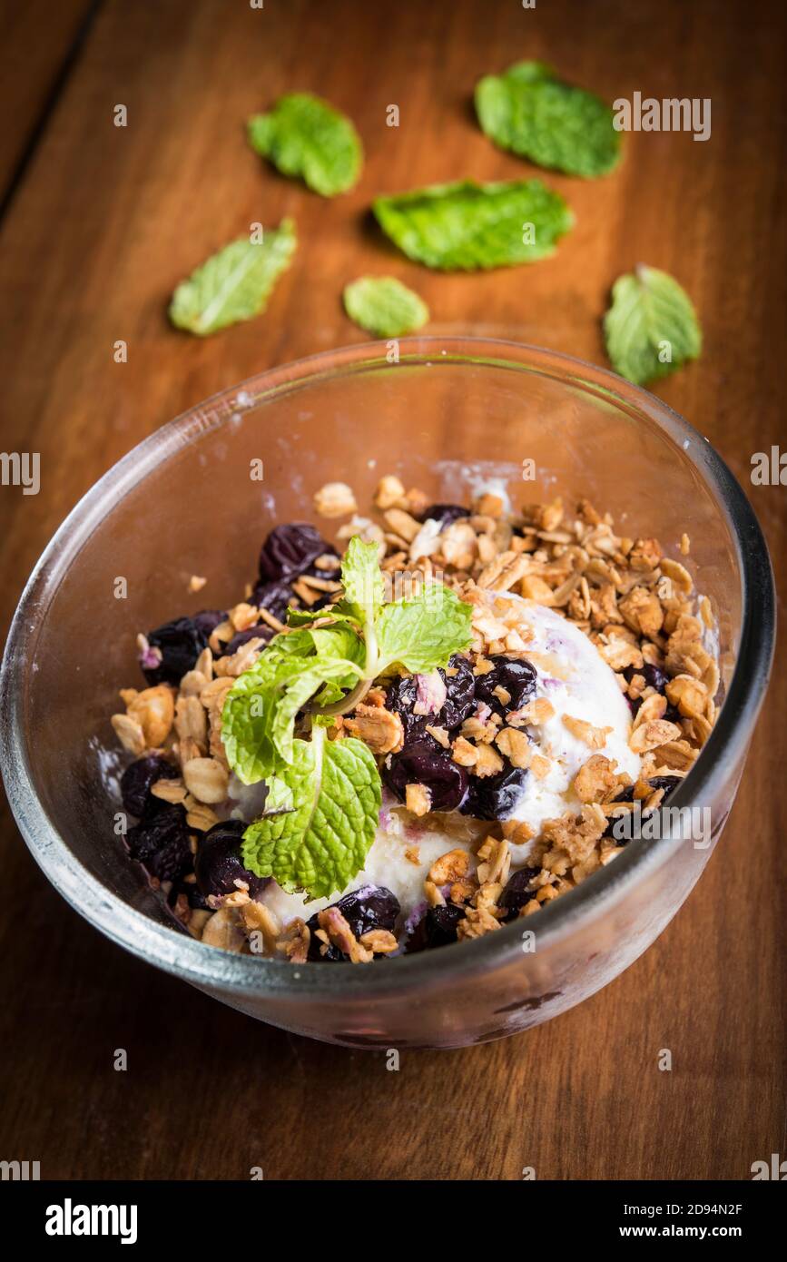 musli fruit bowel with blue berry and mint Stock Photo - Alamy