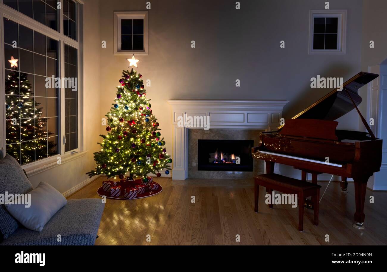 Lighten Christmas tree and glowing fireplace during night time in ...