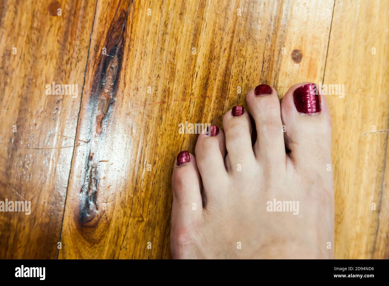 Feet young woman red toenails hi-res stock photography and images - Alamy
