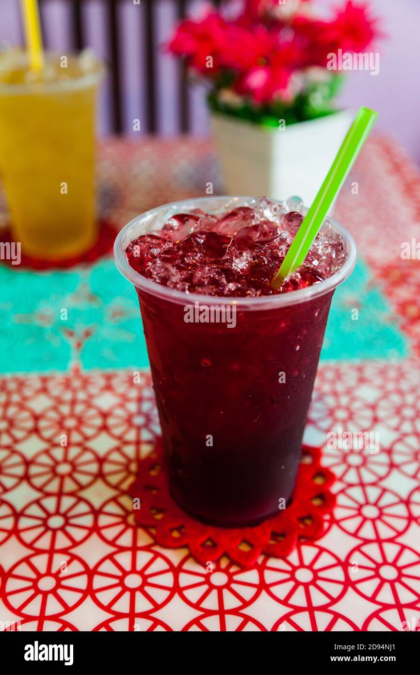 traditional thai drink,Iced roselle juice on the table Stock Photo - Alamy