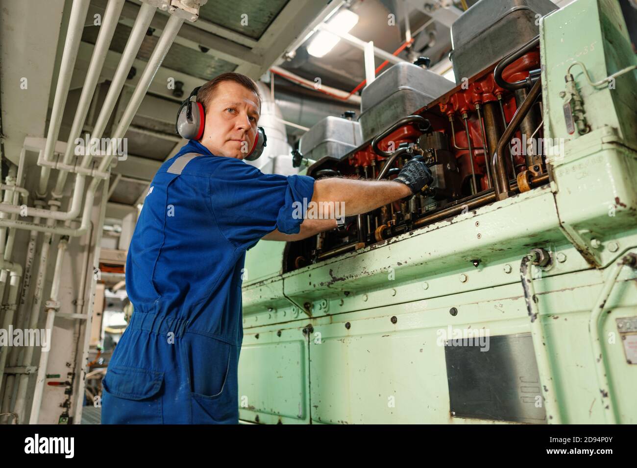 Marine engineer officer controlling vessel enginesand propulsion in ...