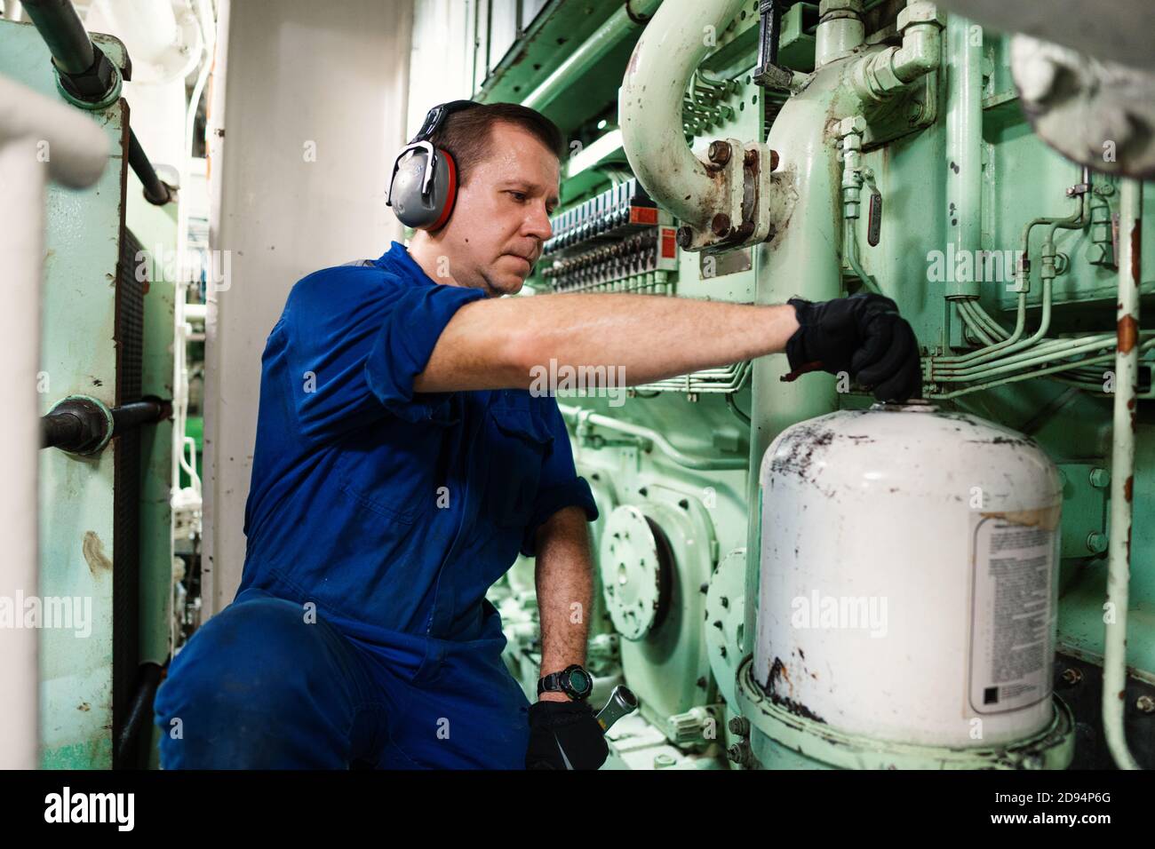 Marine engineer officer controlling vessel enginesand propulsion in ...