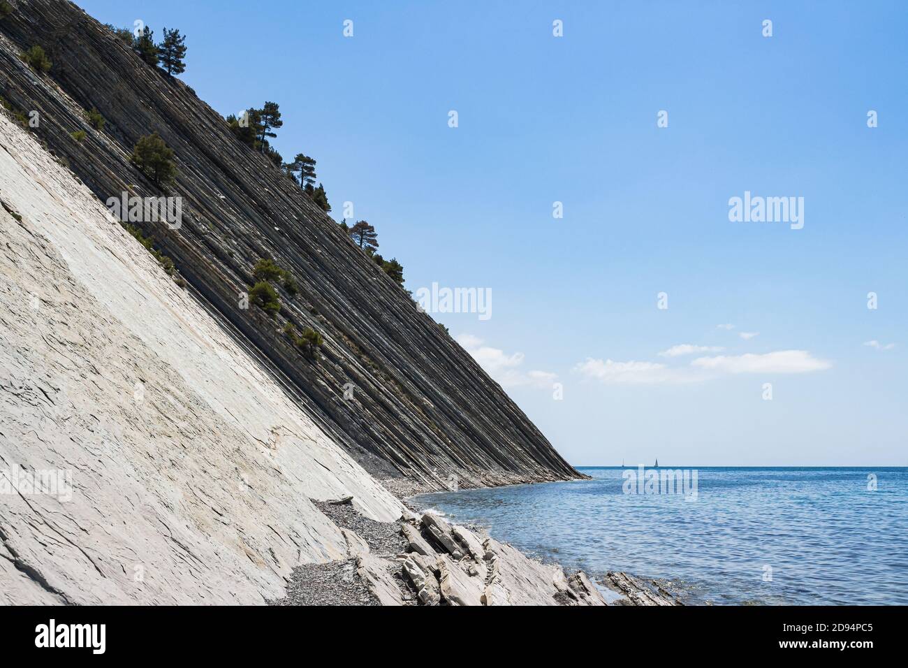 Picturesque summer landscape on a bright day. Stone wild beach, huge ...