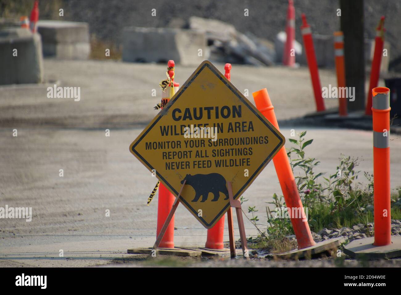 A sign warning about wildlife in the area depicted with a picture of a ...