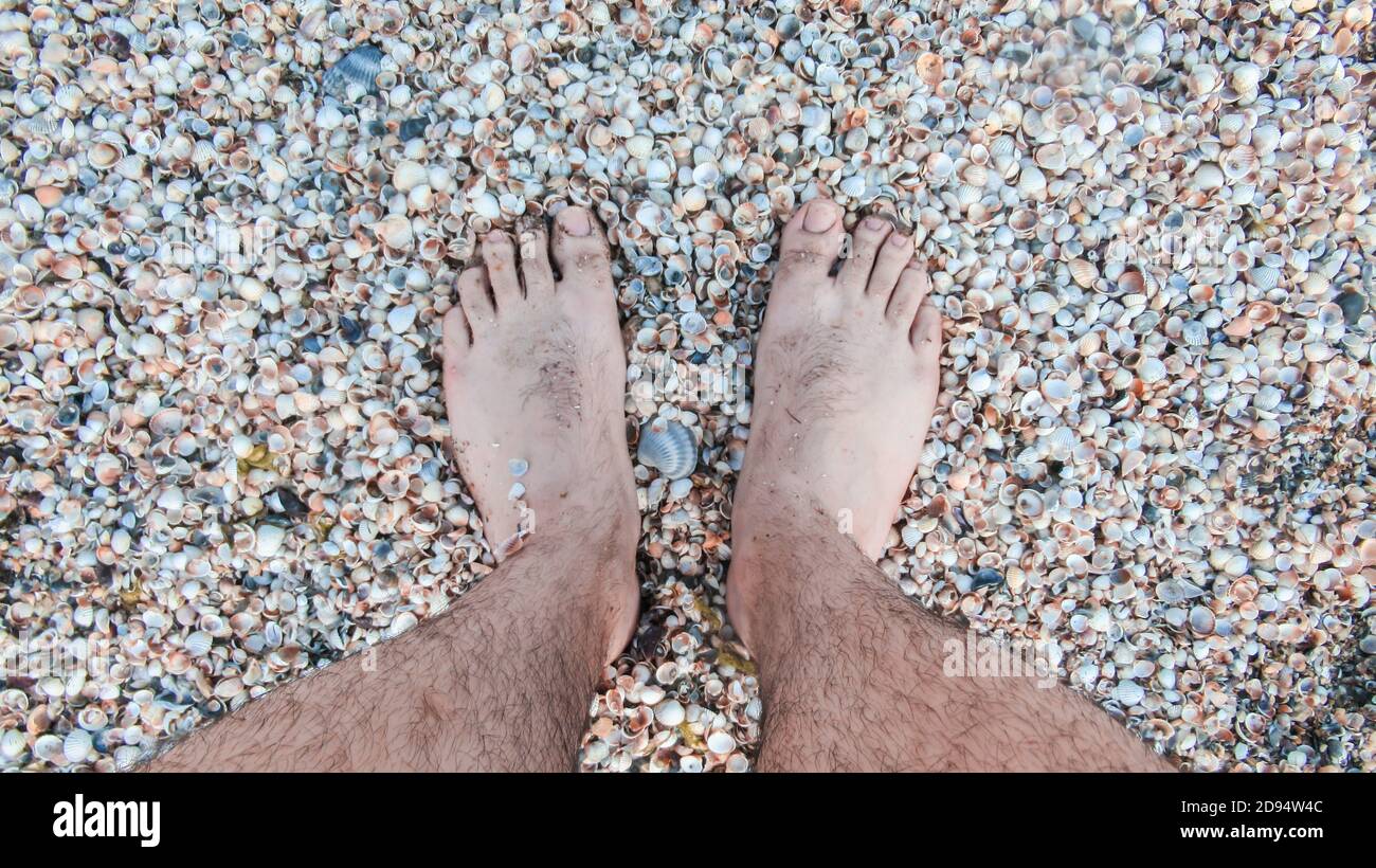 Hairy man feet hi-res stock photography and images - Alamy