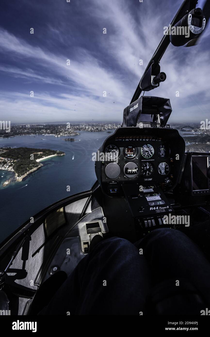 Vertical Interior Of A Helicopter Cockpit Flying Over A Sydney