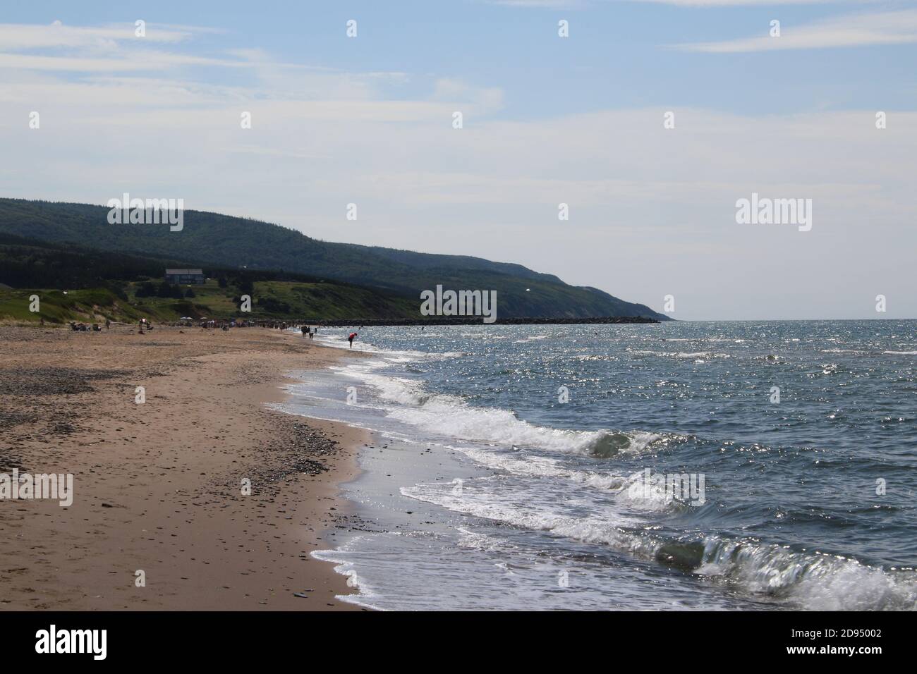 A view of a beach on the Atlantic ocean with waves coming in. You can ...