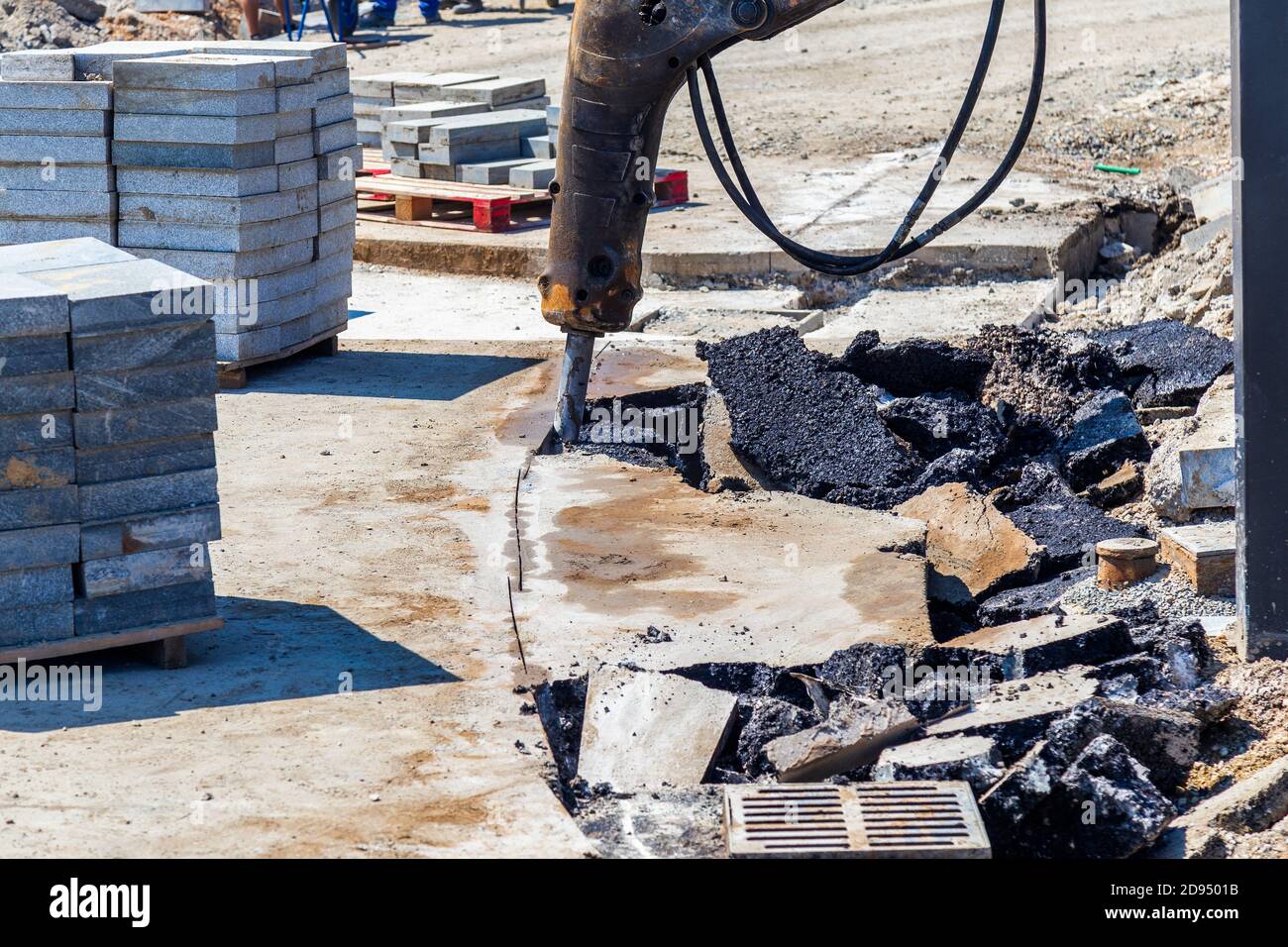 Jackhammer repairing works, breaking the asphalt pavement Stock Photo ...