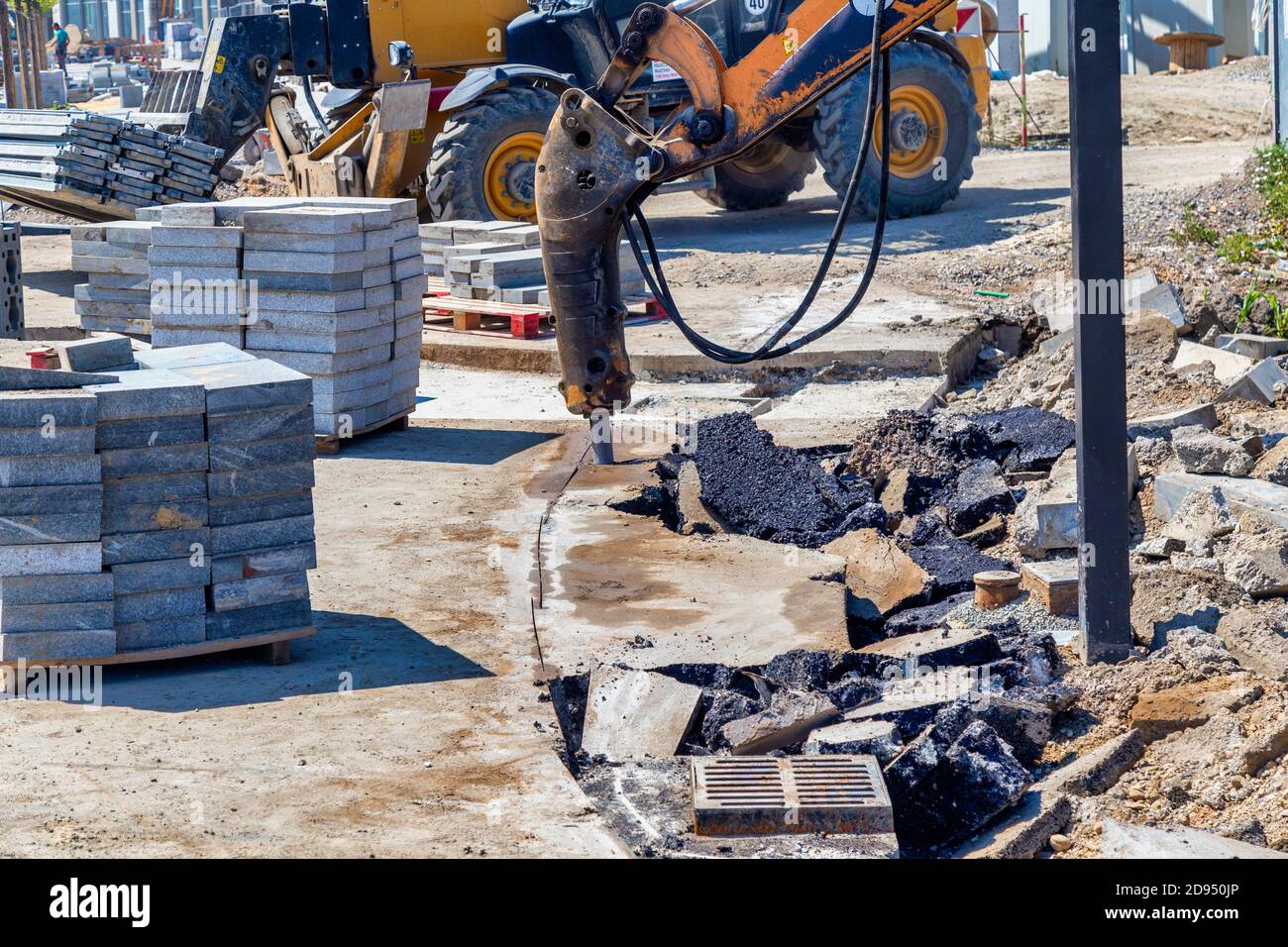Repairing works, breaking the asphalt pavement with jackhammer Stock ...