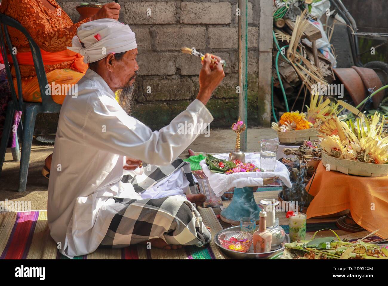 The Hindu Priest or widely known as Pedanda by the Balinese, blessing ...
