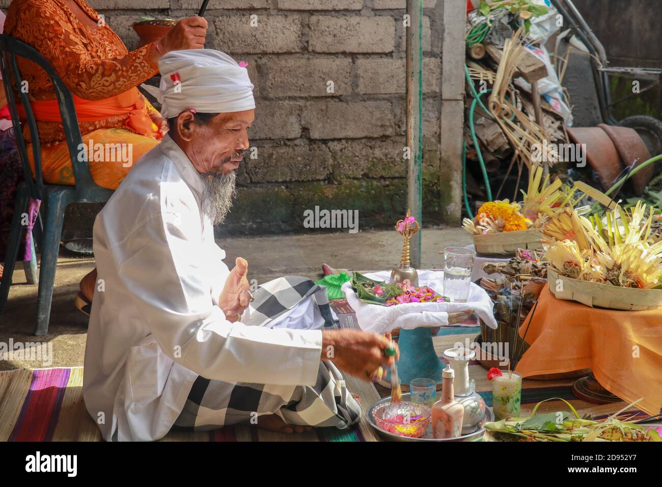 The Hindu Priest or widely known as Pedanda by the Balinese, blessing ...